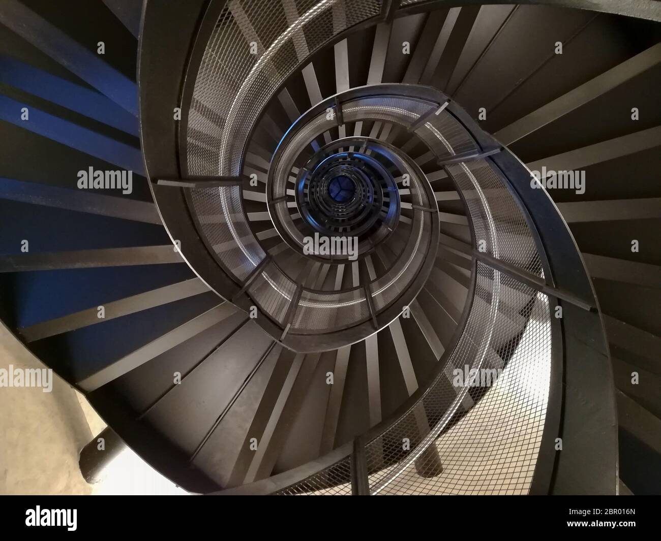 Spiral staircase bottom view. Geometric background Stock Photo - Alamy
