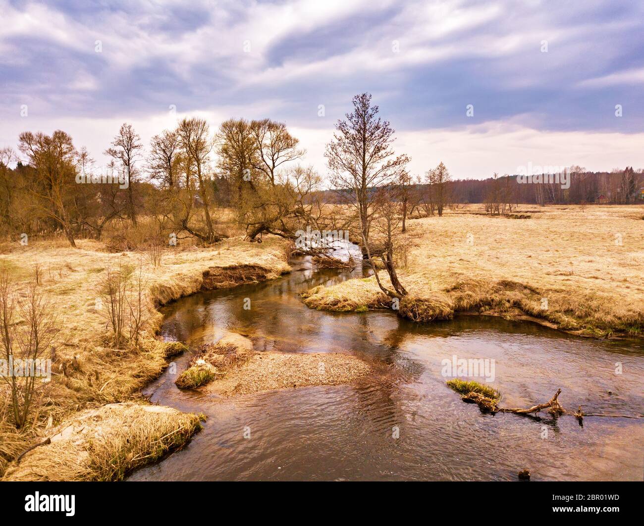 Rural landscape in april. Small River Sula in early spring. Aerial view ...