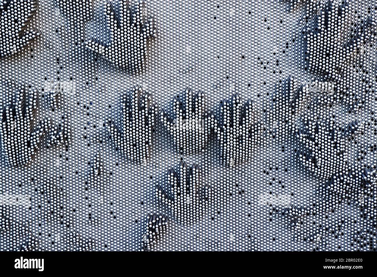 Hand shape in board of movable metal pins Stock Photo - Alamy
