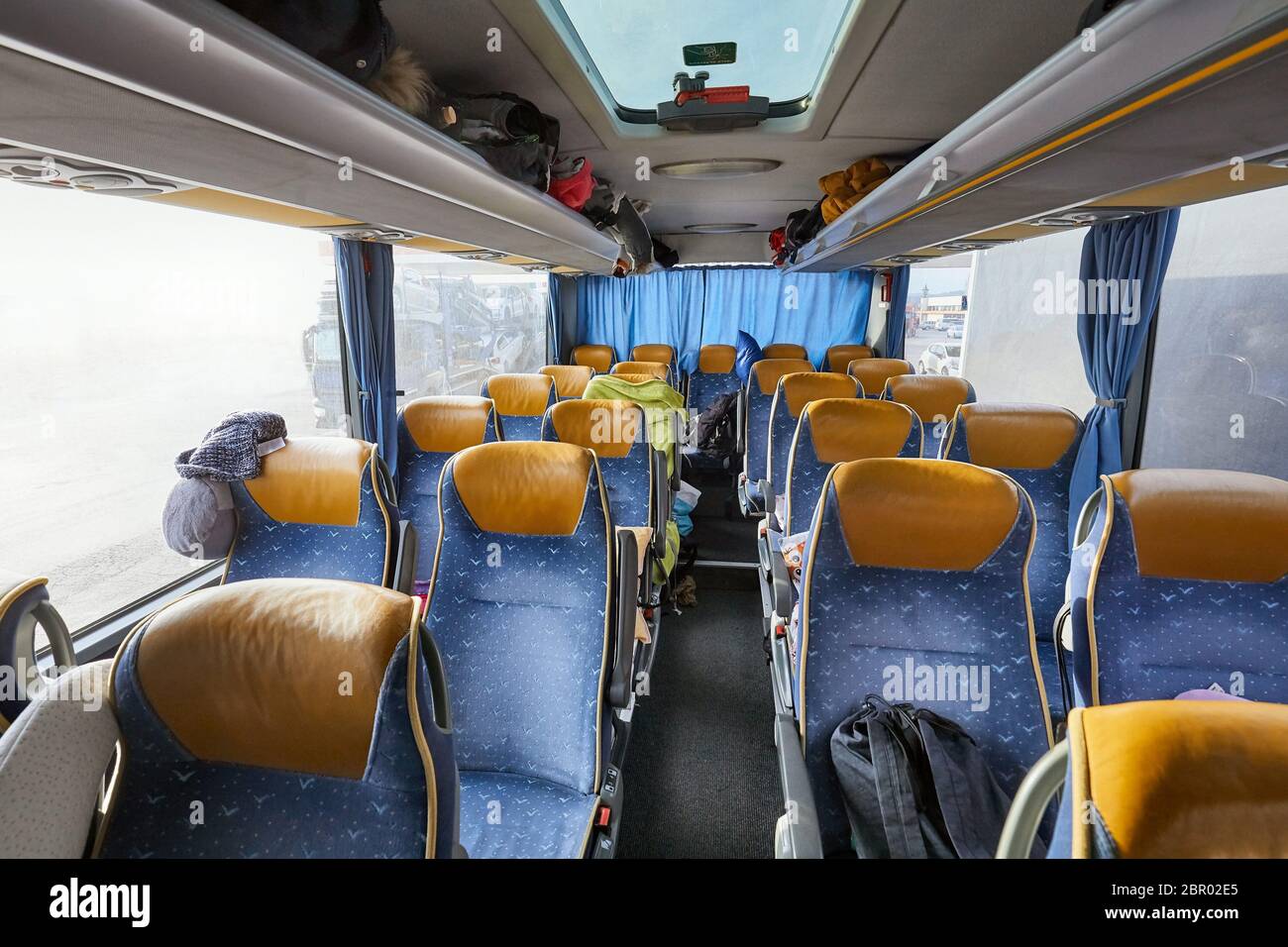 Bus interior empty seats, stop on a long distance trip Stock Photo - Alamy