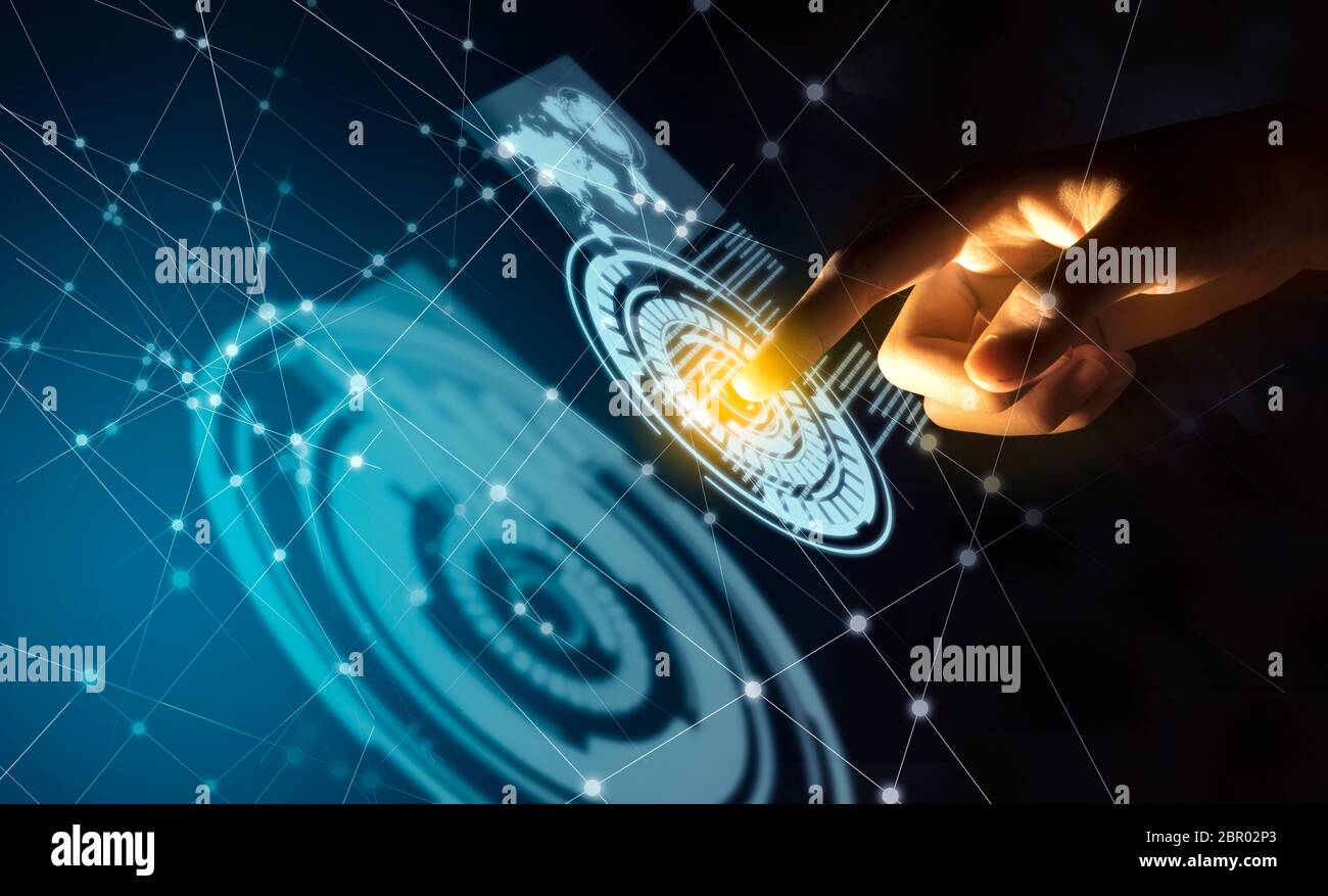 Business finger touching a circle on virtual screen which display the ...