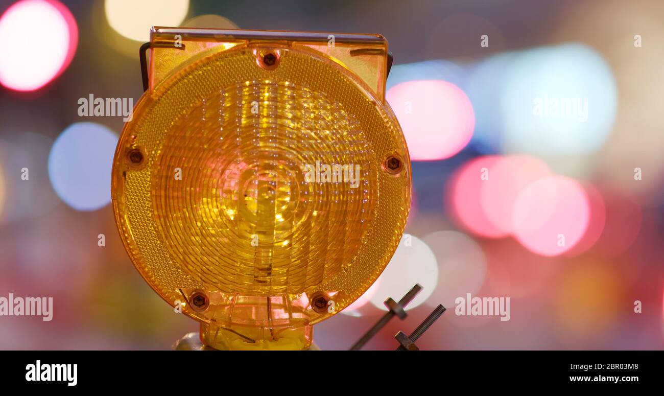 Yellow caution light Stock Photo - Alamy