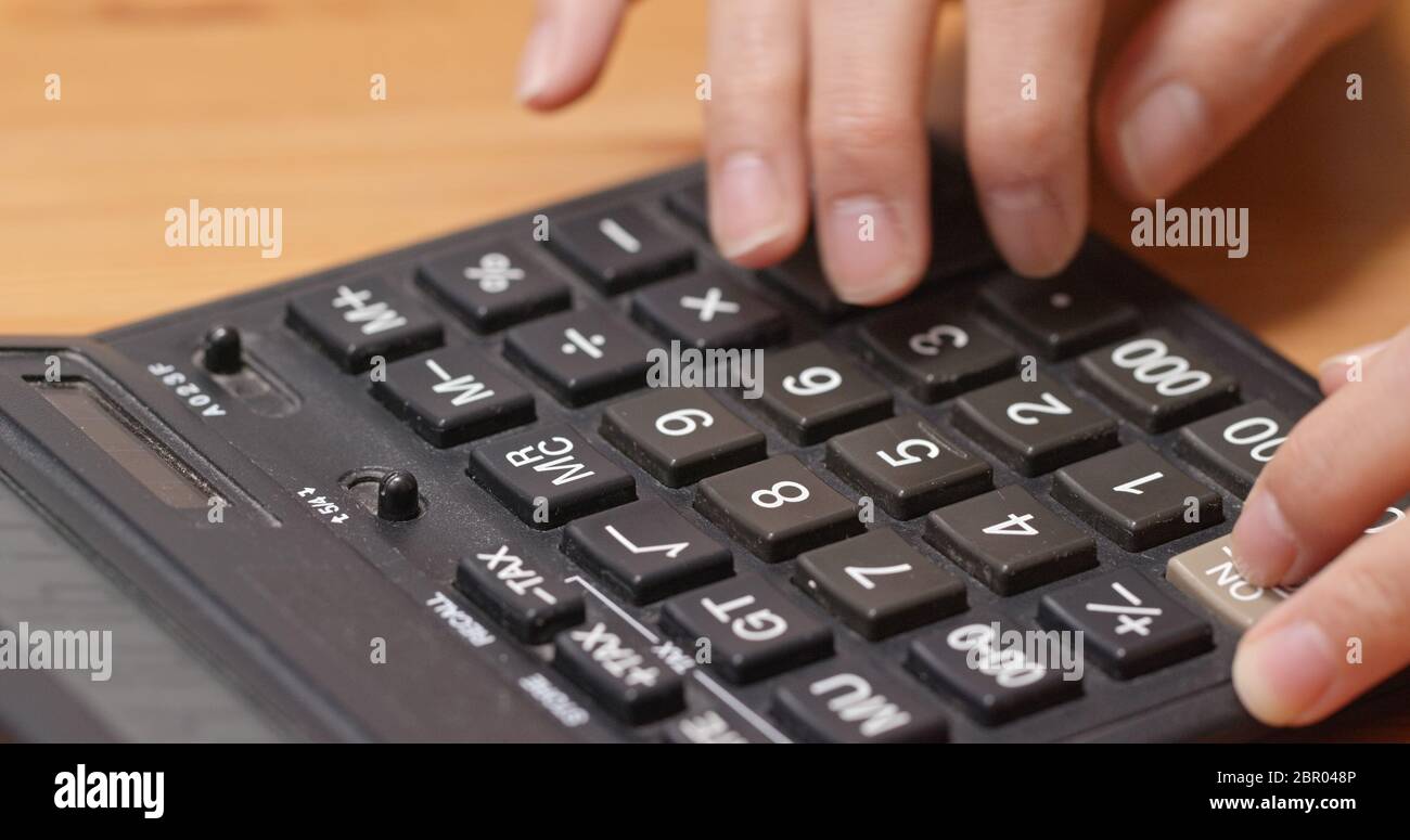 Use of calculator Stock Photo - Alamy