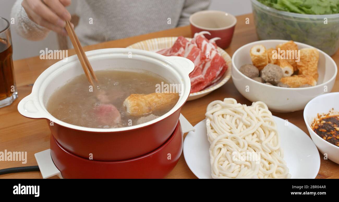 Chinese style hot pot at home Stock Photo - Alamy