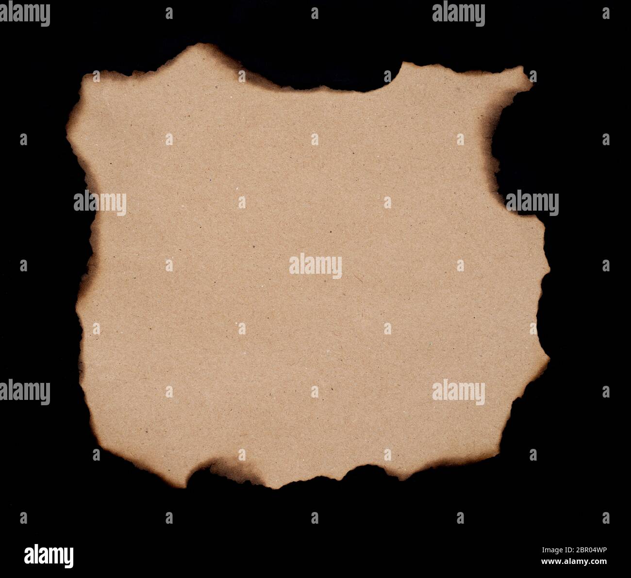burnt paper sheet isolated on black background Stock Photo - Alamy