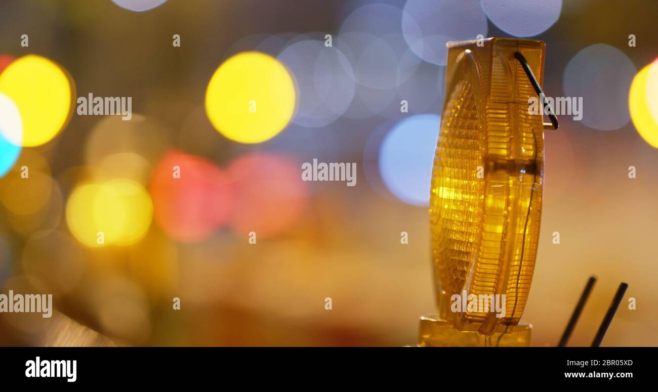 Yellow caution light in the street at night Stock Photo - Alamy