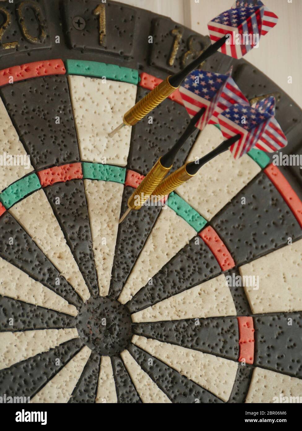 Darts in dartboard target Stock Photo - Alamy
