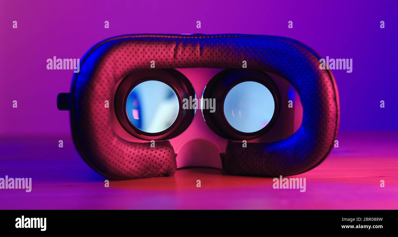 Virtual reality device with purple and pink light Stock Photo - Alamy