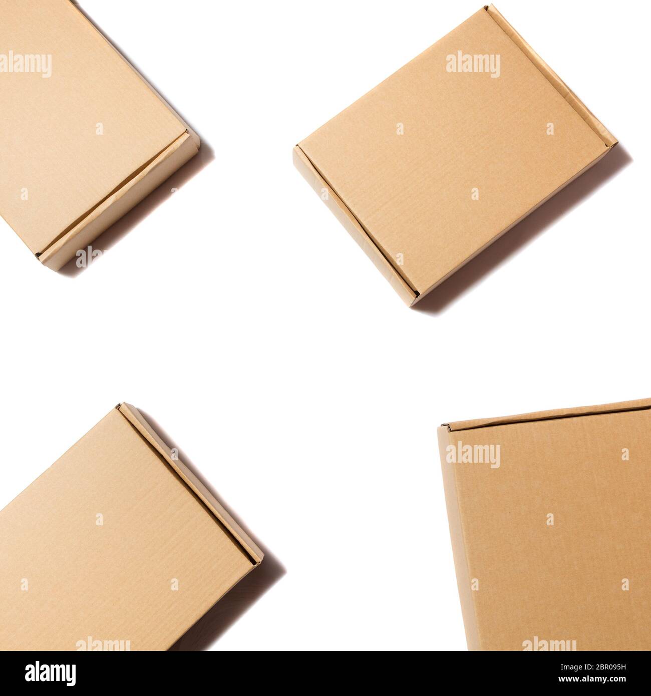 group of cardboard boxes on white background Stock Photo - Alamy