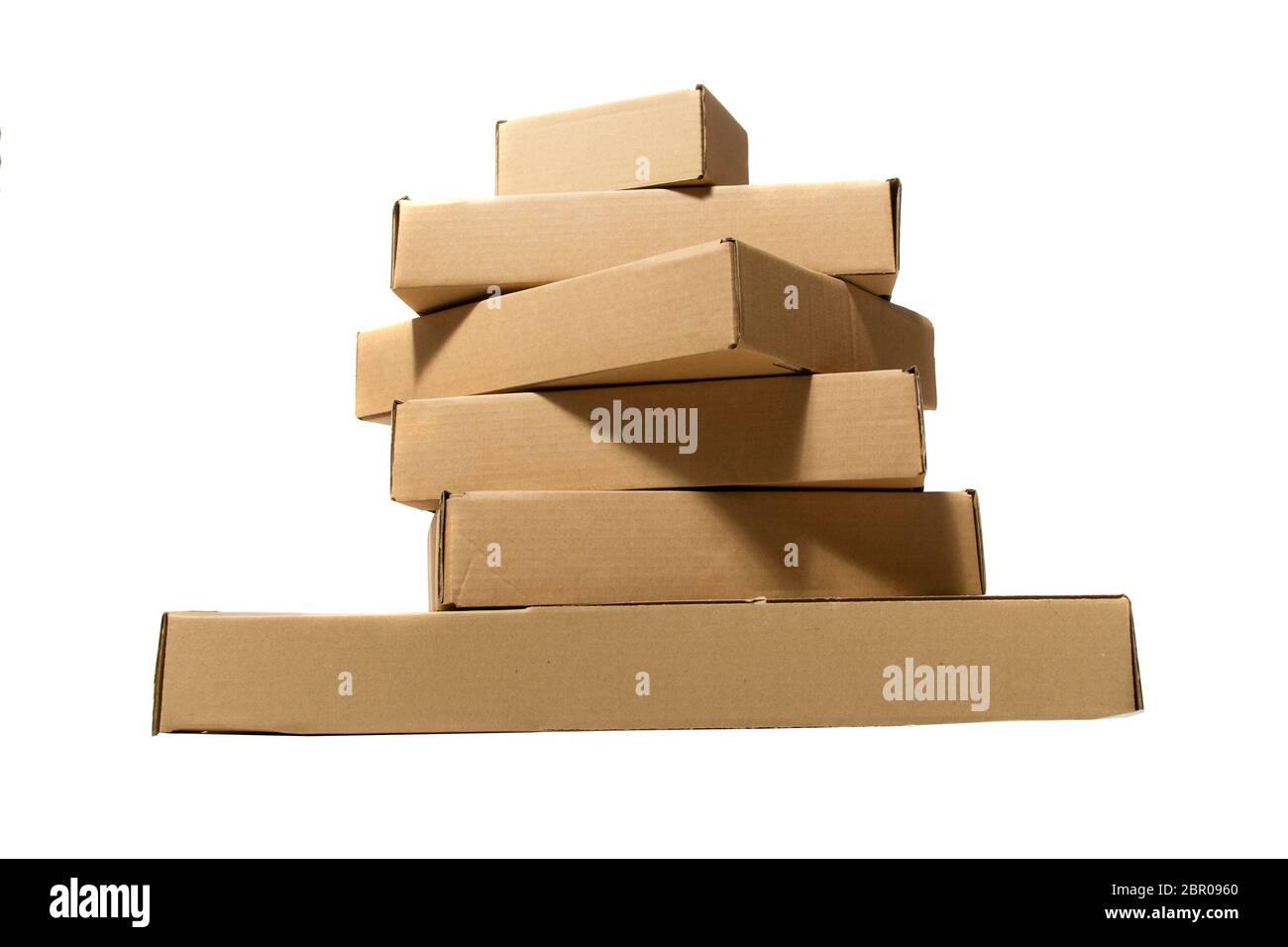 Stack of cardboard boxes isolated on white background Stock Photo - Alamy