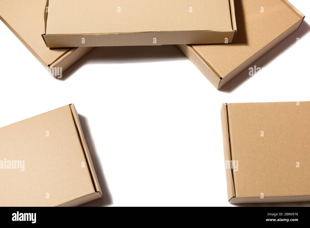 group of cardboard boxes on white background Stock Photo - Alamy