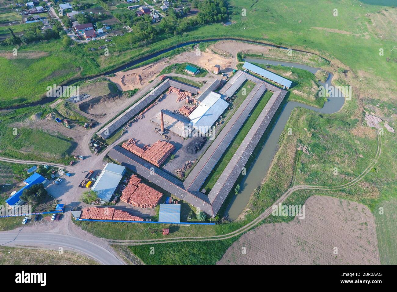 Brick production plant. Top view of a small factory for firing bricks ...