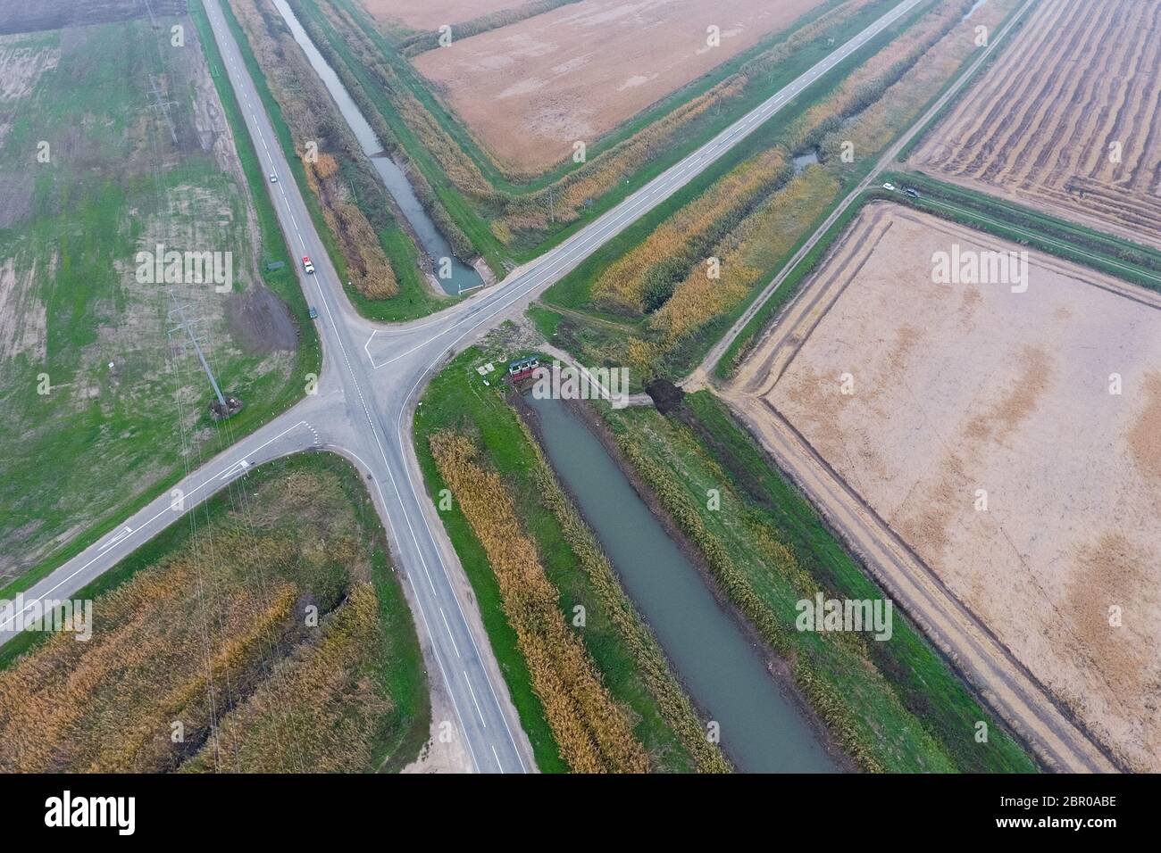 Crossroads paved roads through the fields. View from above Stock Photo ...