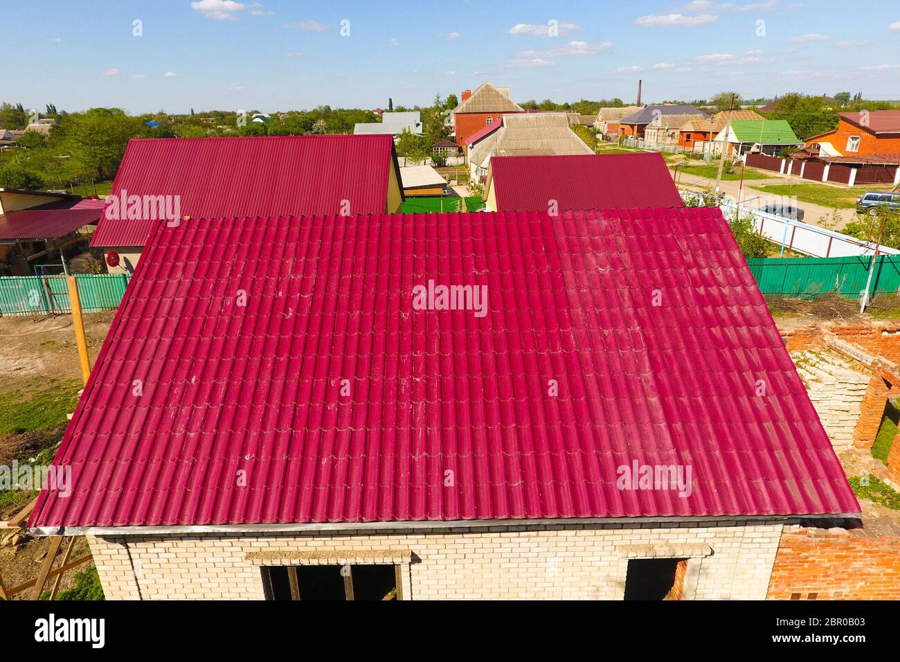 Red Corrugated Metal Houses