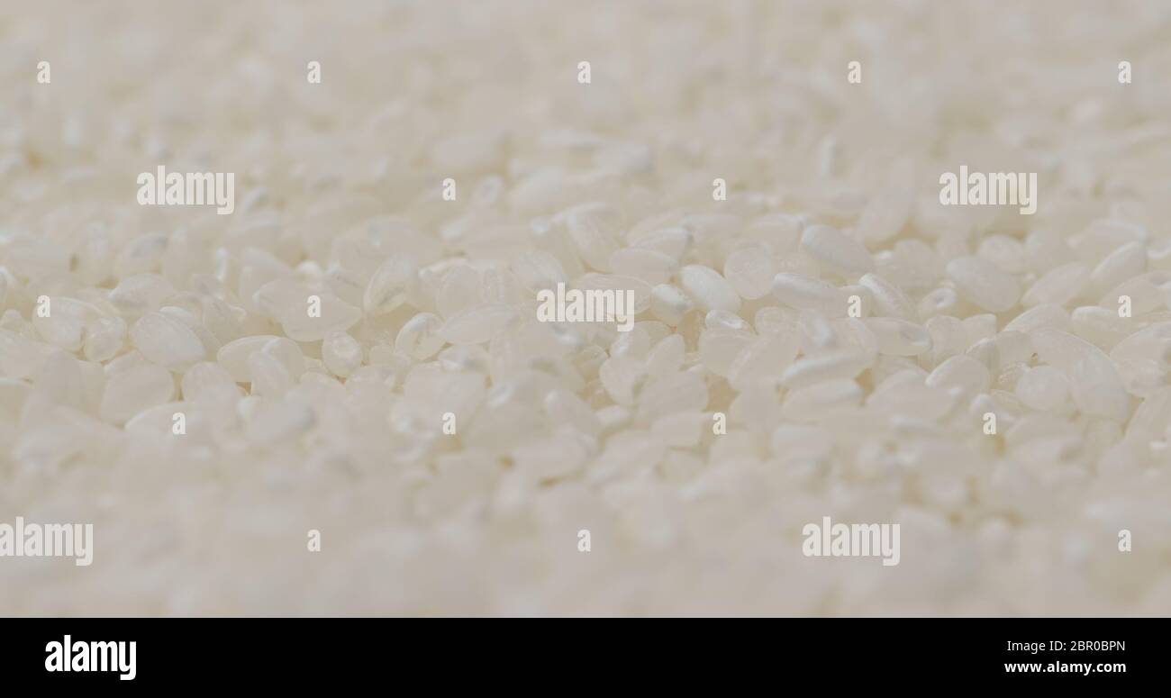 Stack of white rice Stock Photo - Alamy