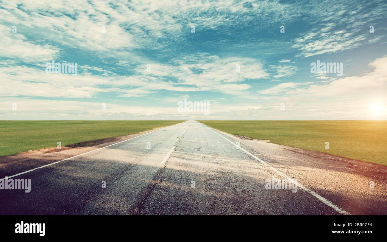 Panoramic road sunrise summer travel background Stock Photo - Alamy