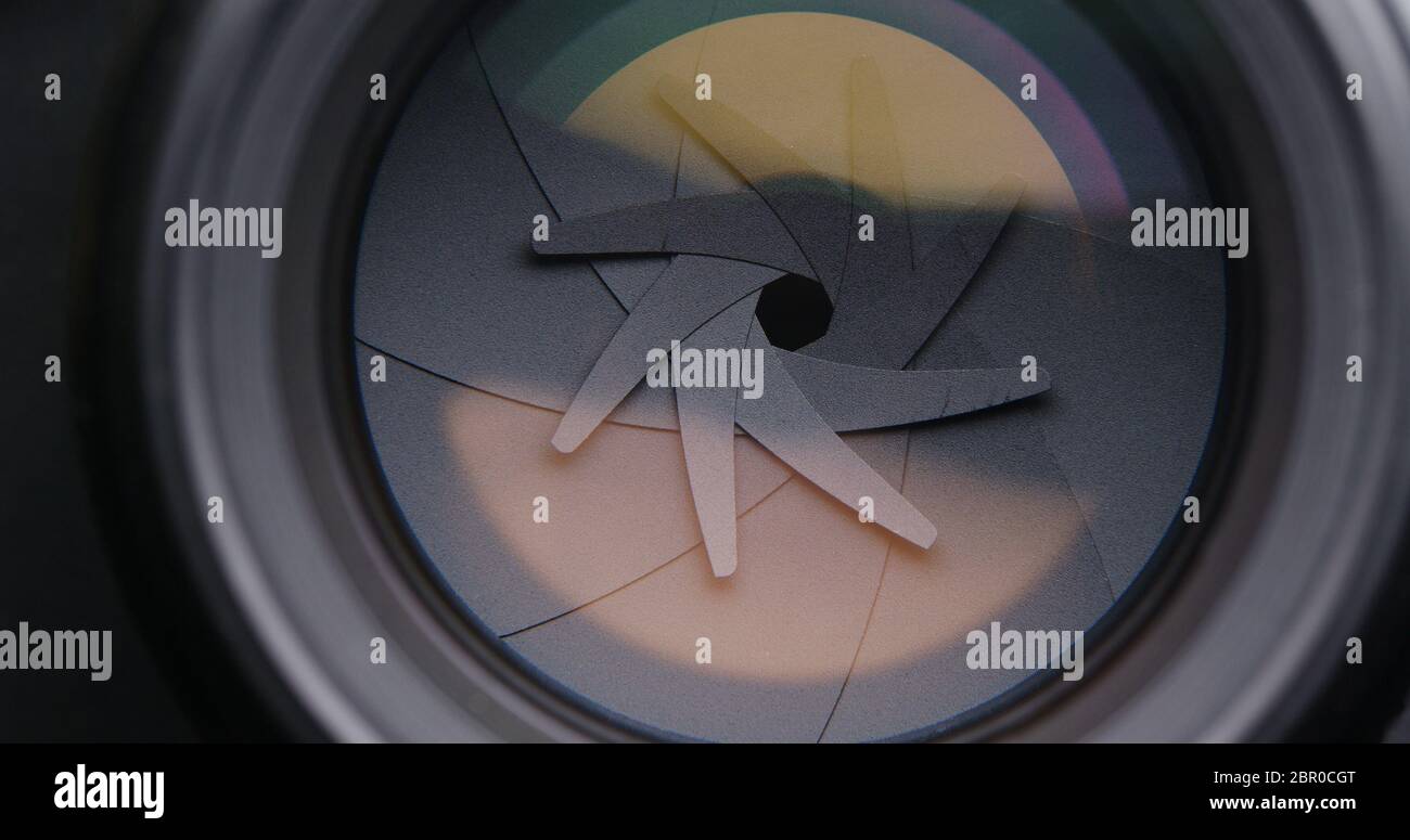 Adjusting Camera lens aperture Stock Photo - Alamy