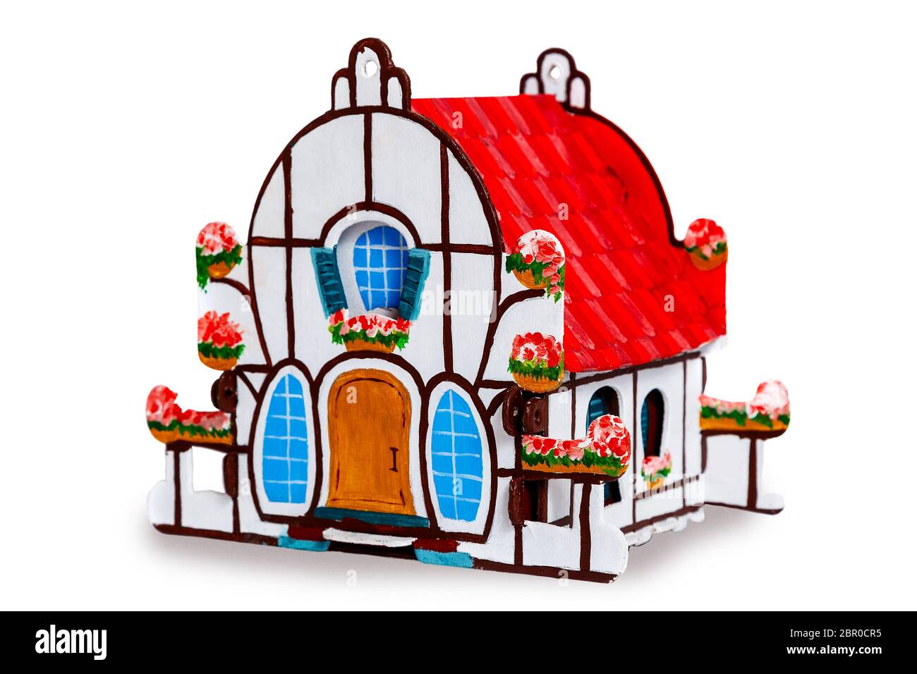 Cardboard toy house isolated on white background Stock Photo - Alamy