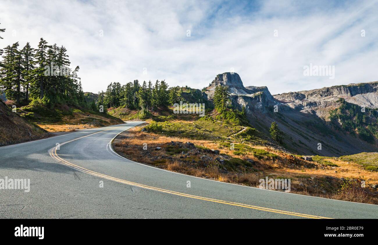 scenic view of curve and slope asphalt road on the mountain on the day ...