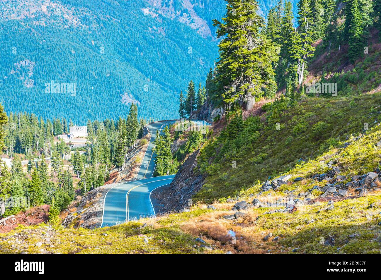 scenic view of curve and slope asphalt road on the mountain on the day ...