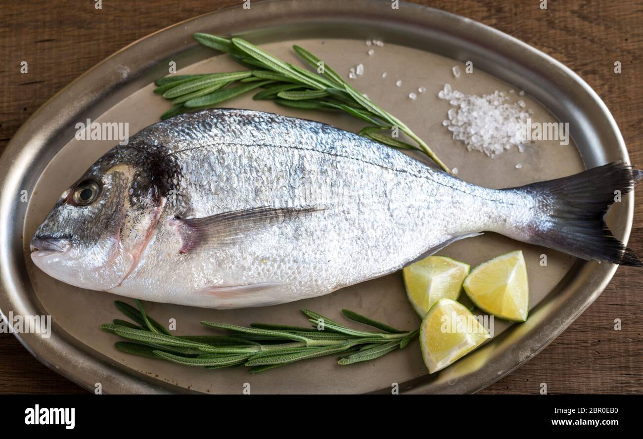 Raw dorada seabass fish hi-res stock photography and images - Alamy
