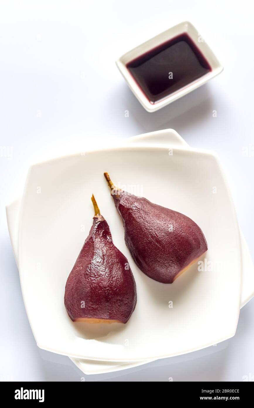 Halves poached pear hi-res stock photography and images - Alamy