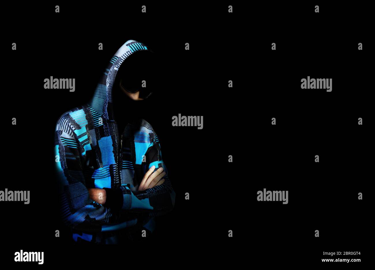 Unknown person in the hood. Danger in darkness. Concept Stock Photo - Alamy