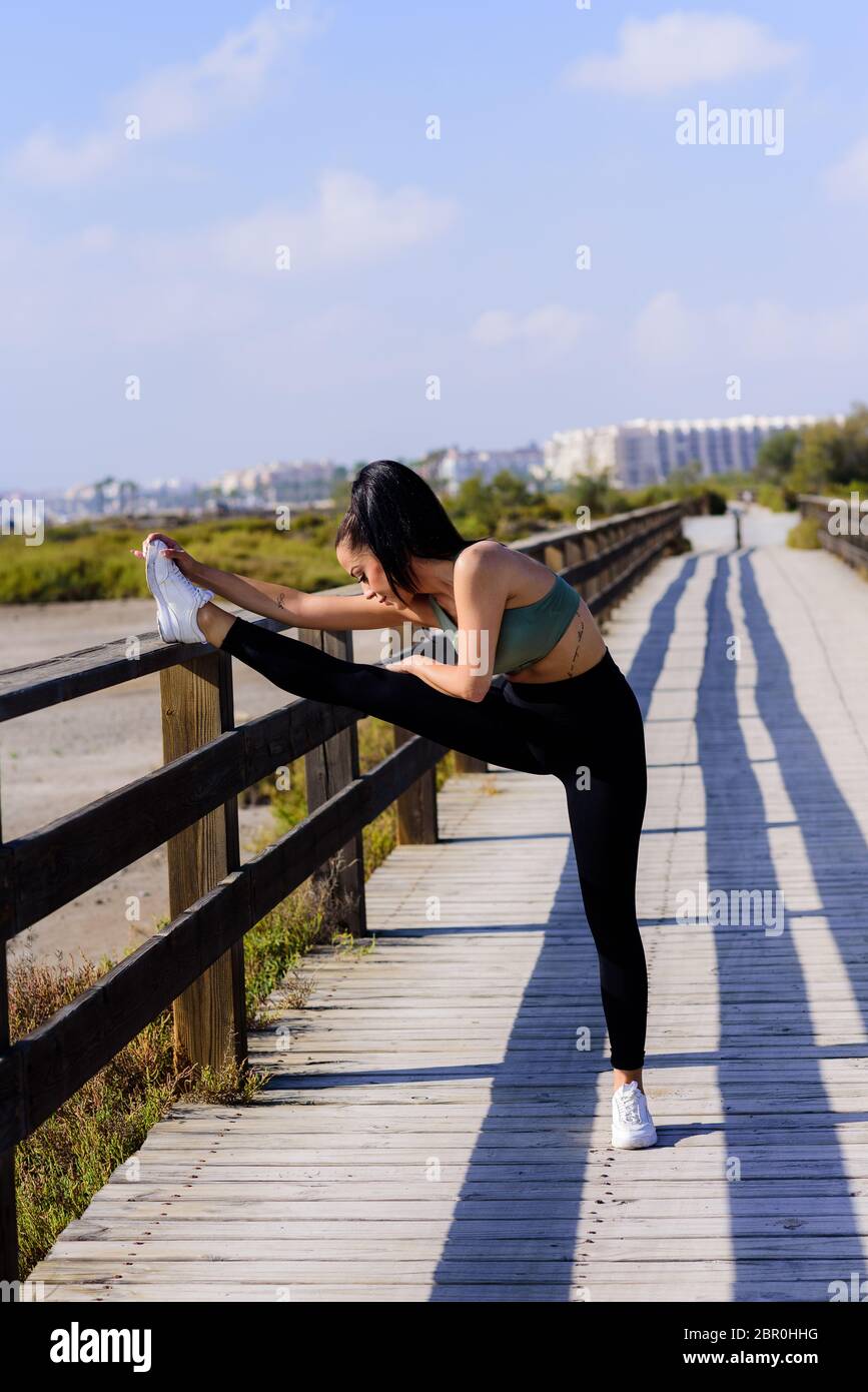 Sportive woman at beach hi-res stock photography and images - Alamy