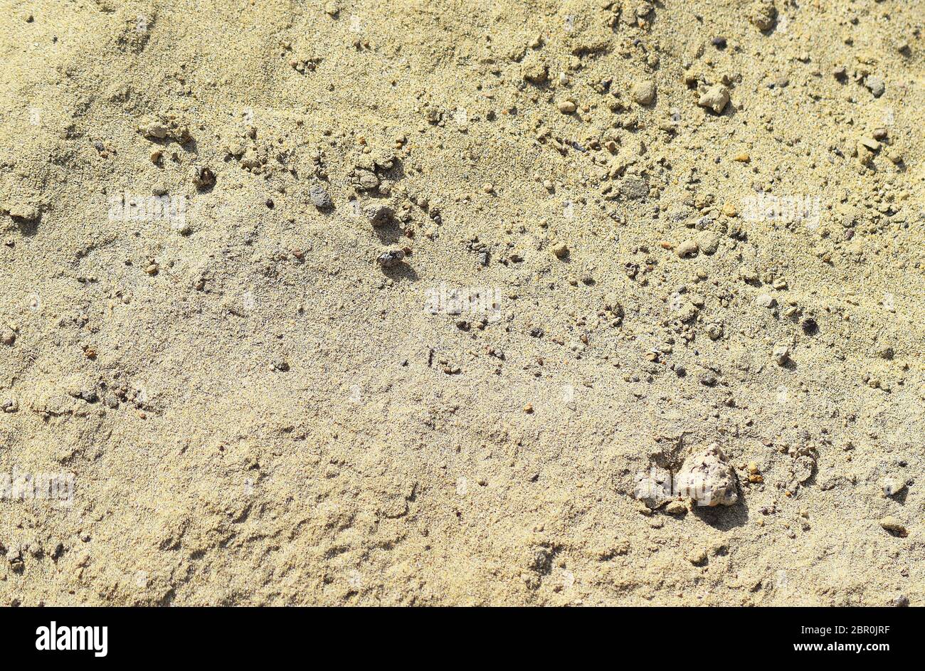 Background of building sand. Building materials. The texture of the ...