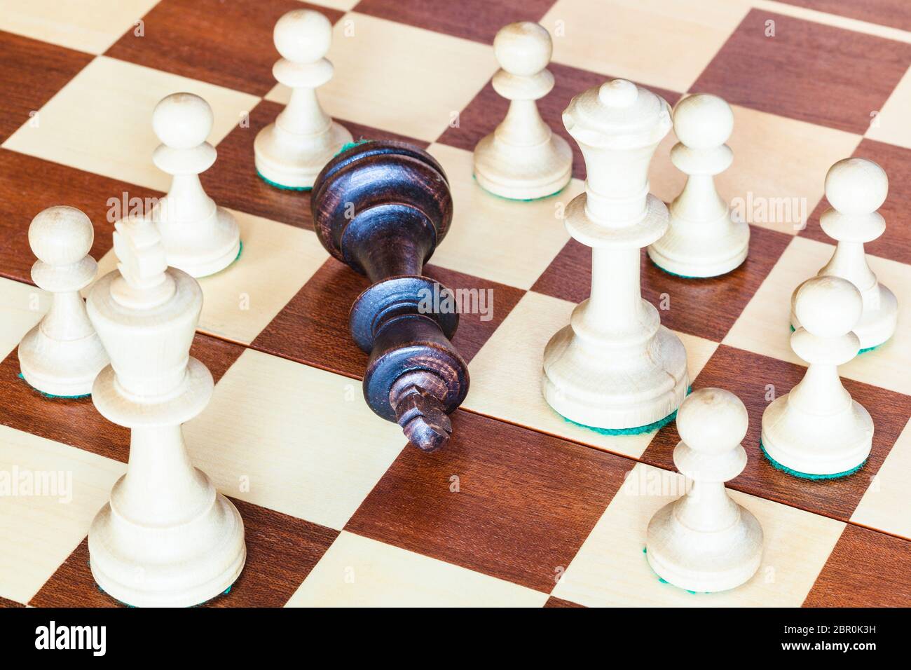 business concept - falling black chess king and wining white chess ...