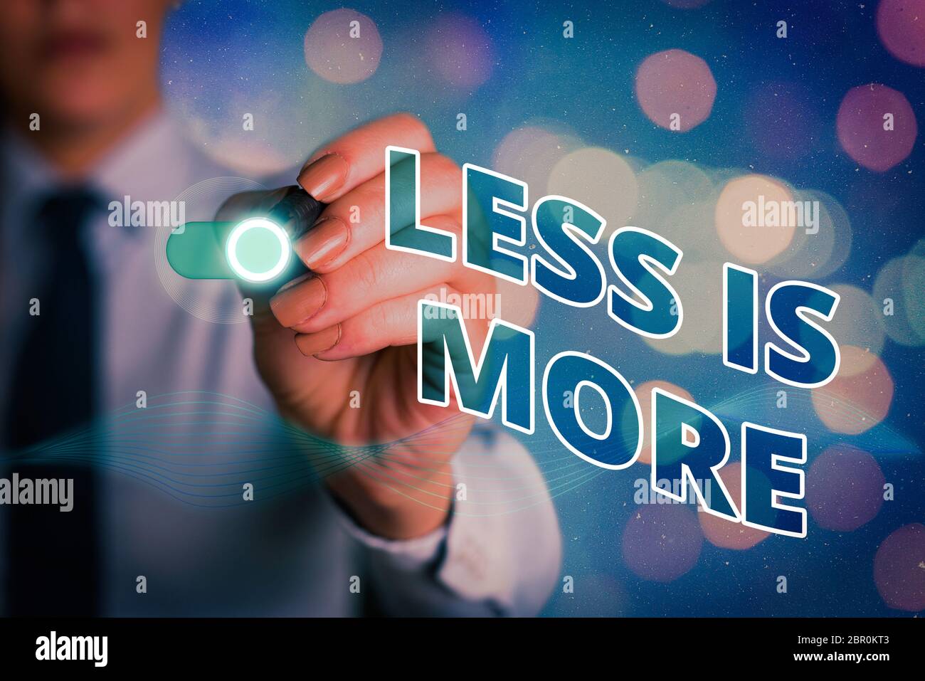 Writing note showing Less Is More. Business concept for used to express ...