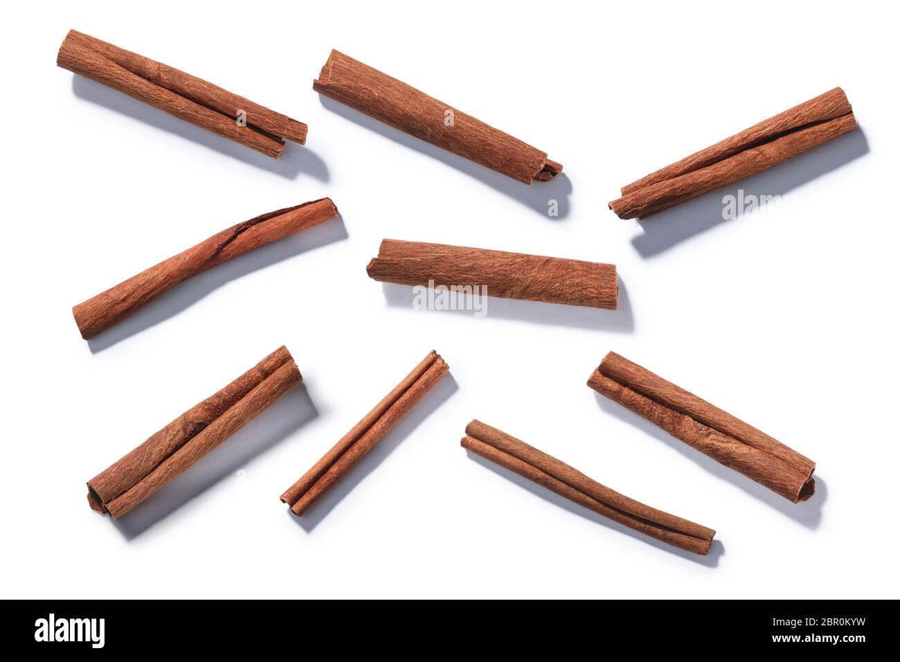 Cinnamon or cassia sticks (dried bark) isolated on white, top view ...