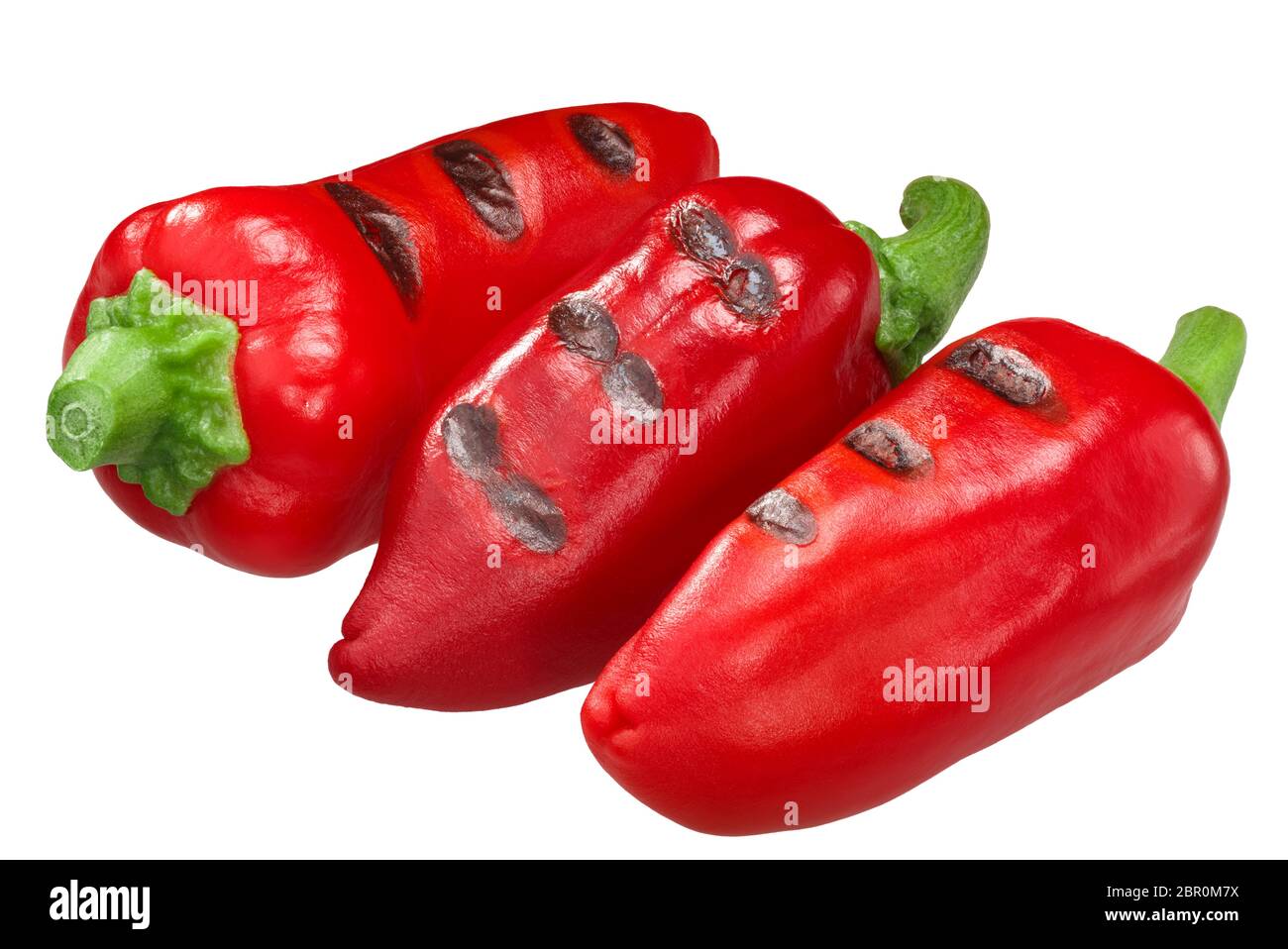 Grilled or fire roasted red chile peppers, whole pods Stock Photo - Alamy