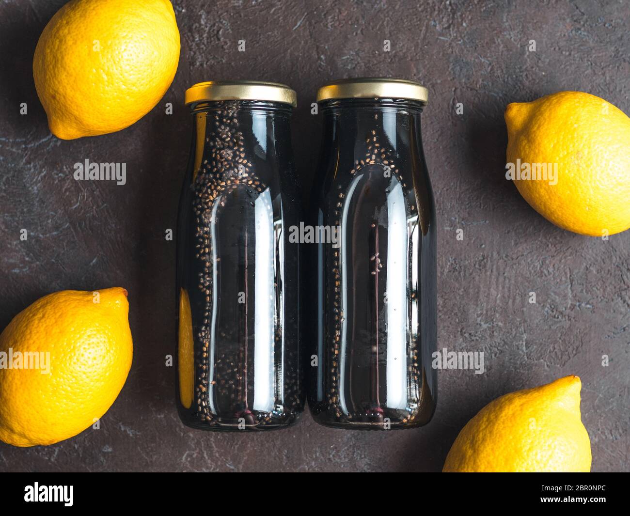 Detox activated charcoal black chia water or lemonade with lemon. Two ...