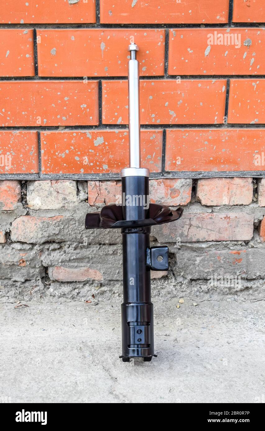Car strut. Front shock absorber of a car Stock Photo - Alamy
