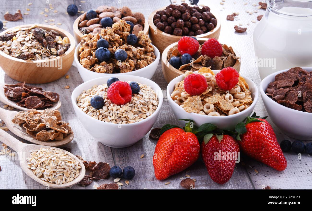 Bowls containing different sorts of breakfast cereal products Stock ...