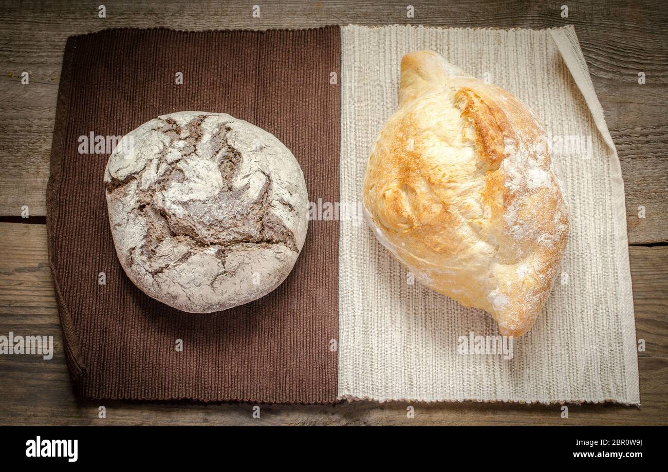 Black and white - rye and wheat bread Stock Photo - Alamy