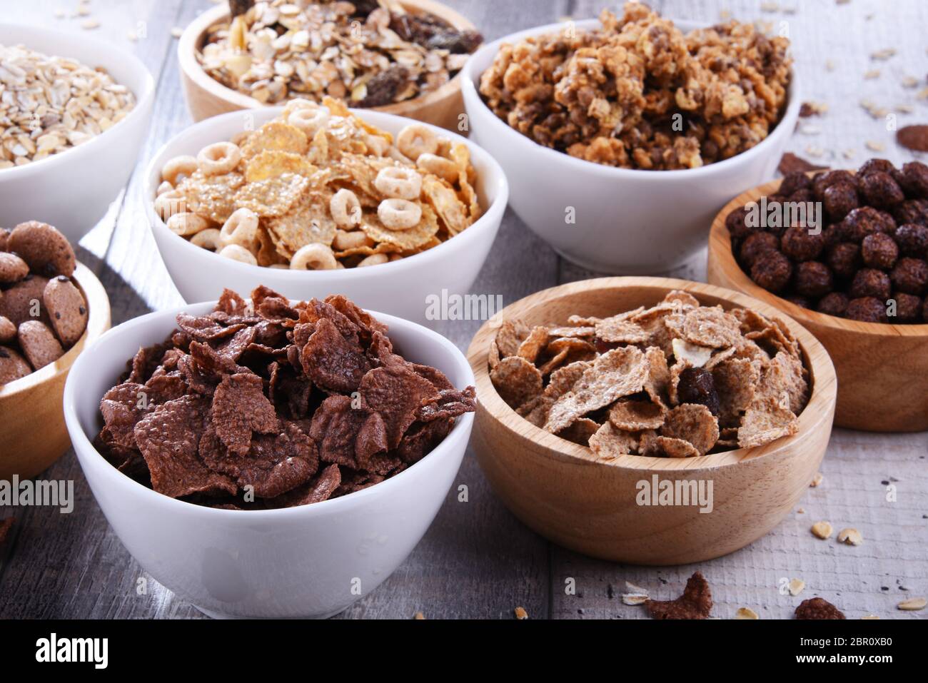 Bowls containing different sorts of breakfast cereal products Stock ...