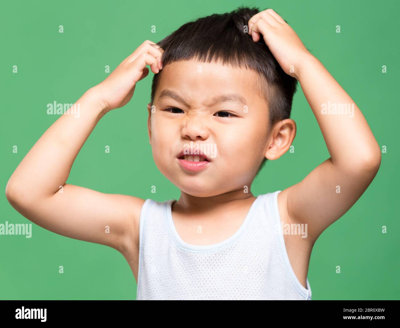 Boy Scratching Head High Resolution Stock Photography and Images - Alamy