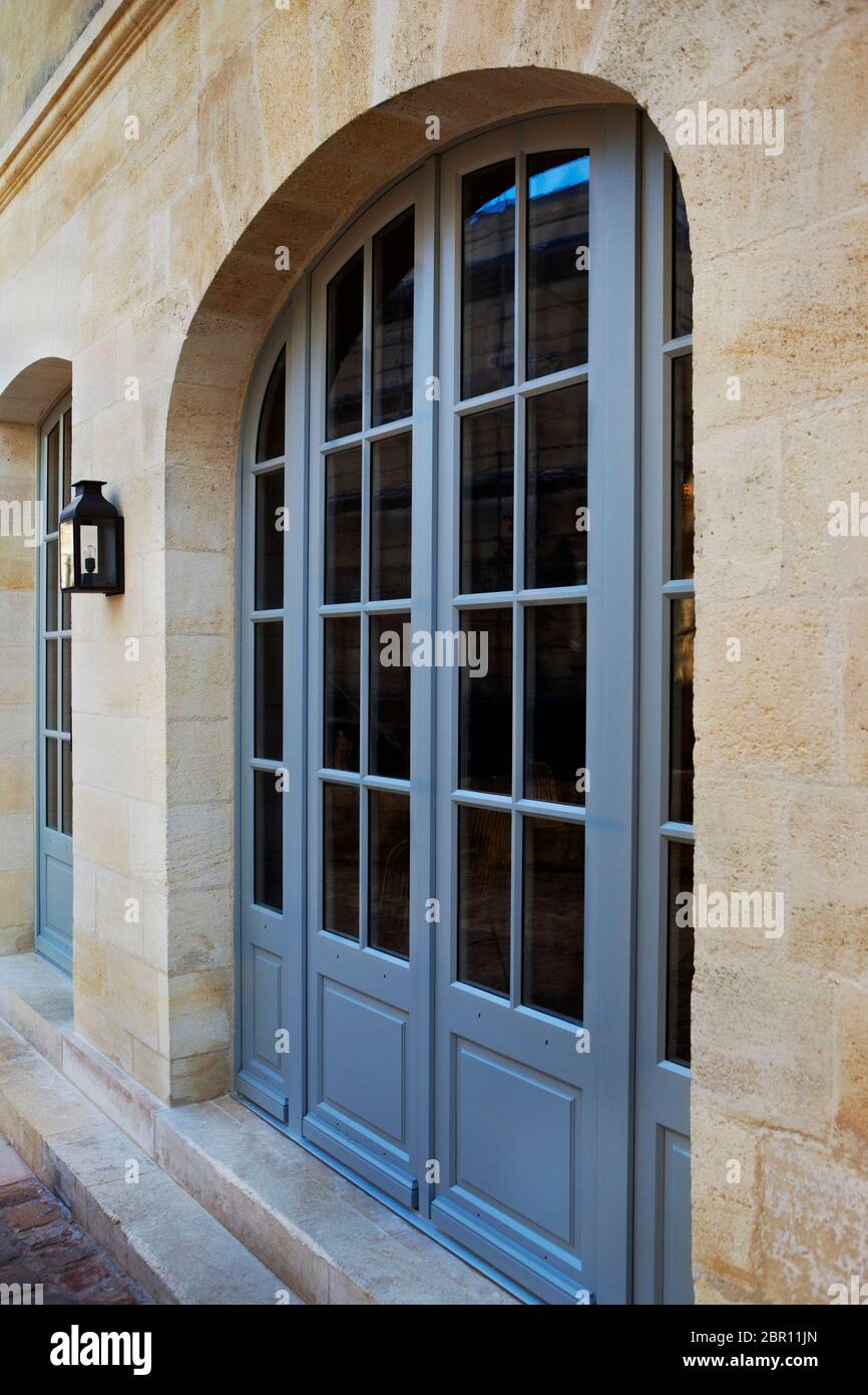Window on the facade of a typical French mansion Stock Photo - Alamy