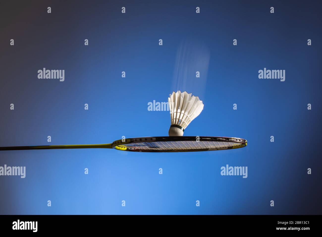 Badminton racket and shuttlecock in motion closeup Stock Photo - Alamy