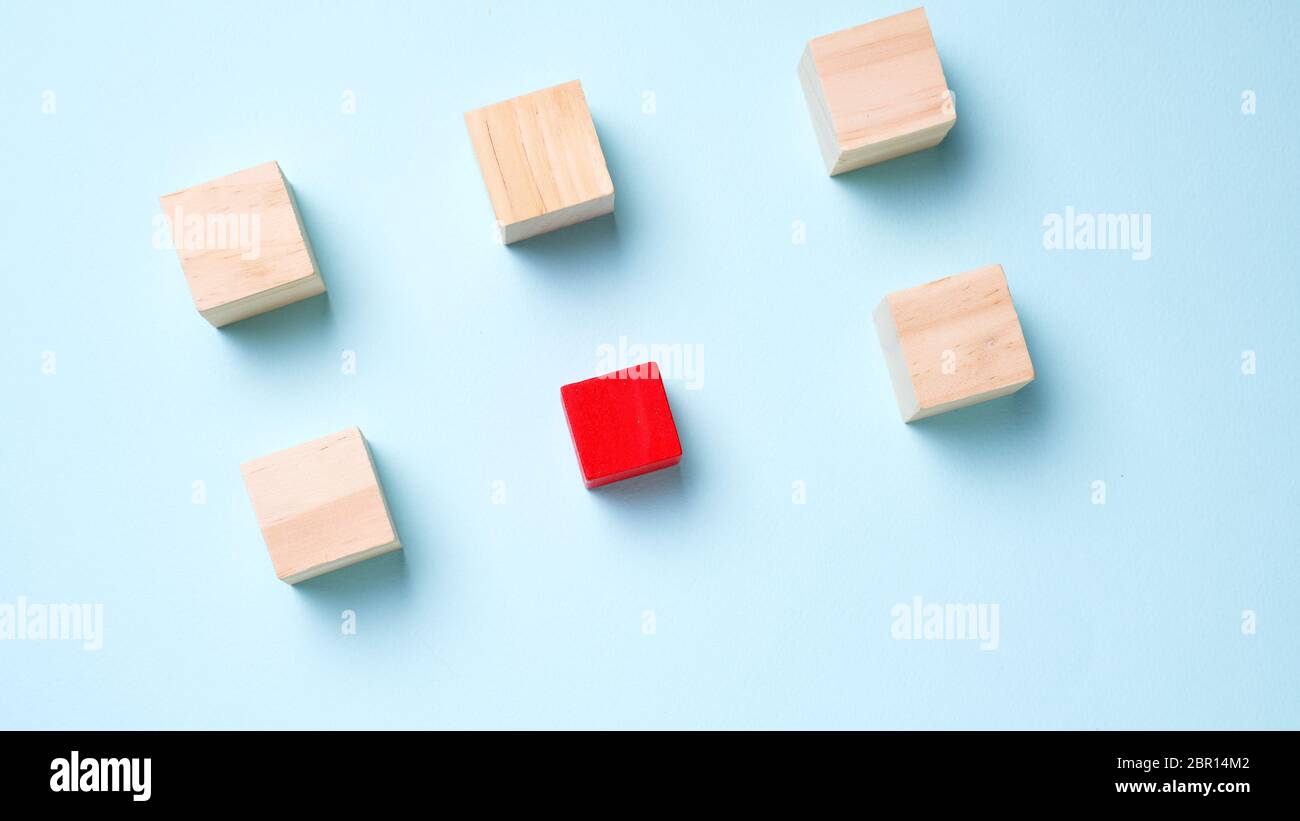 Wooden cubes blue background, business concept Stock Photo - Alamy