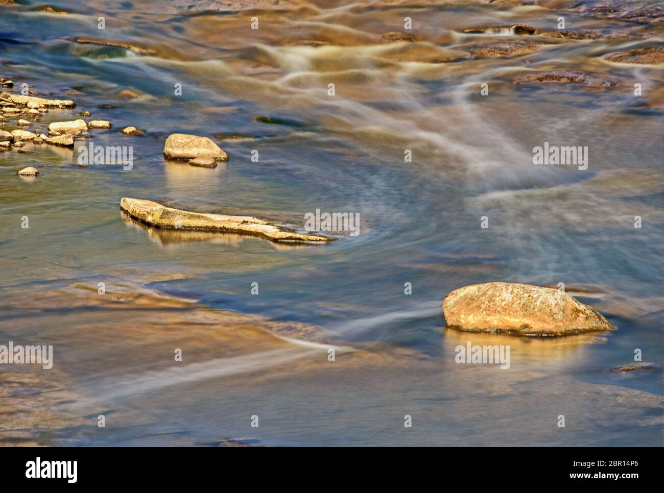 The gentle flow of Pendle Water creates an interesting pattern, in ...