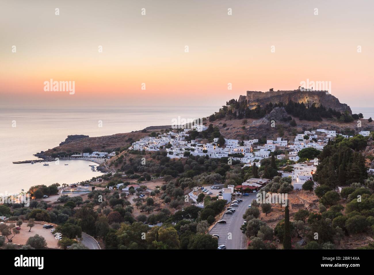 Lindos with the castle above on the Greek Island of Rhodes Stock Photo ...