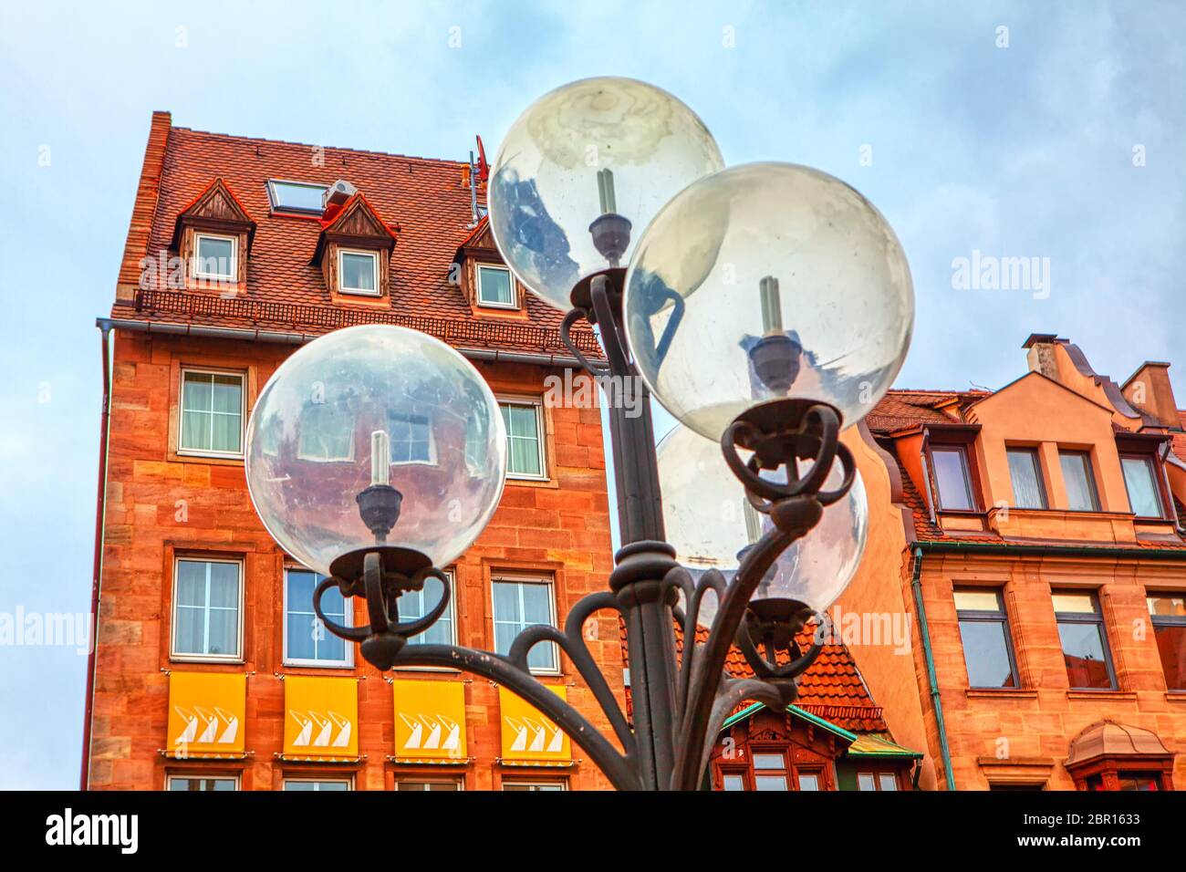 sphere-shaped street lamps in old town Stock Photo - Alamy