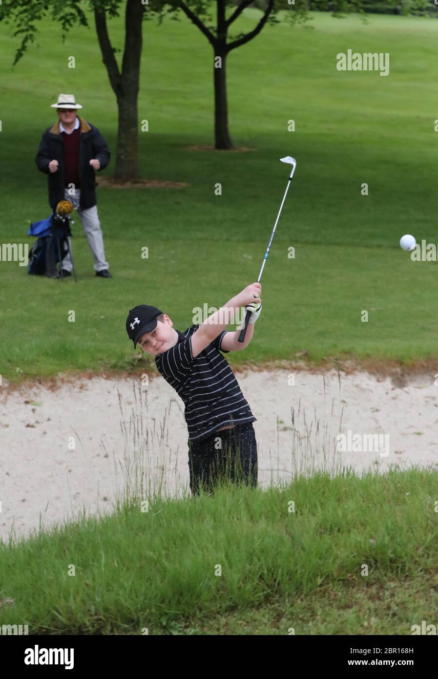 11 year old Aaron O'Reilly playing at Dunmurry Golf Club in Belfast ...