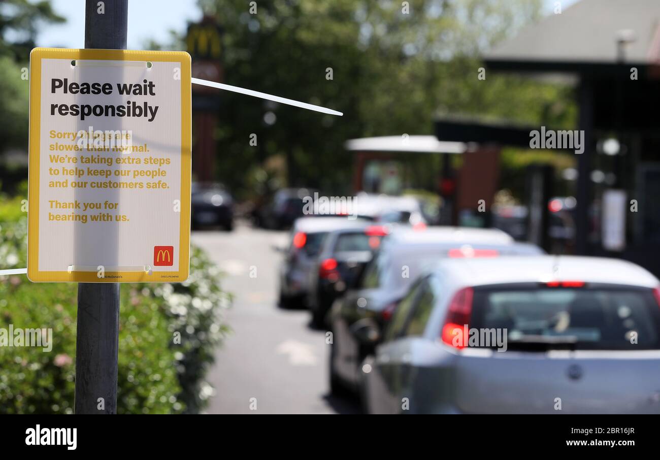 Cars queue at the McDonald's drive-thru at the Artane Castle shopping ...