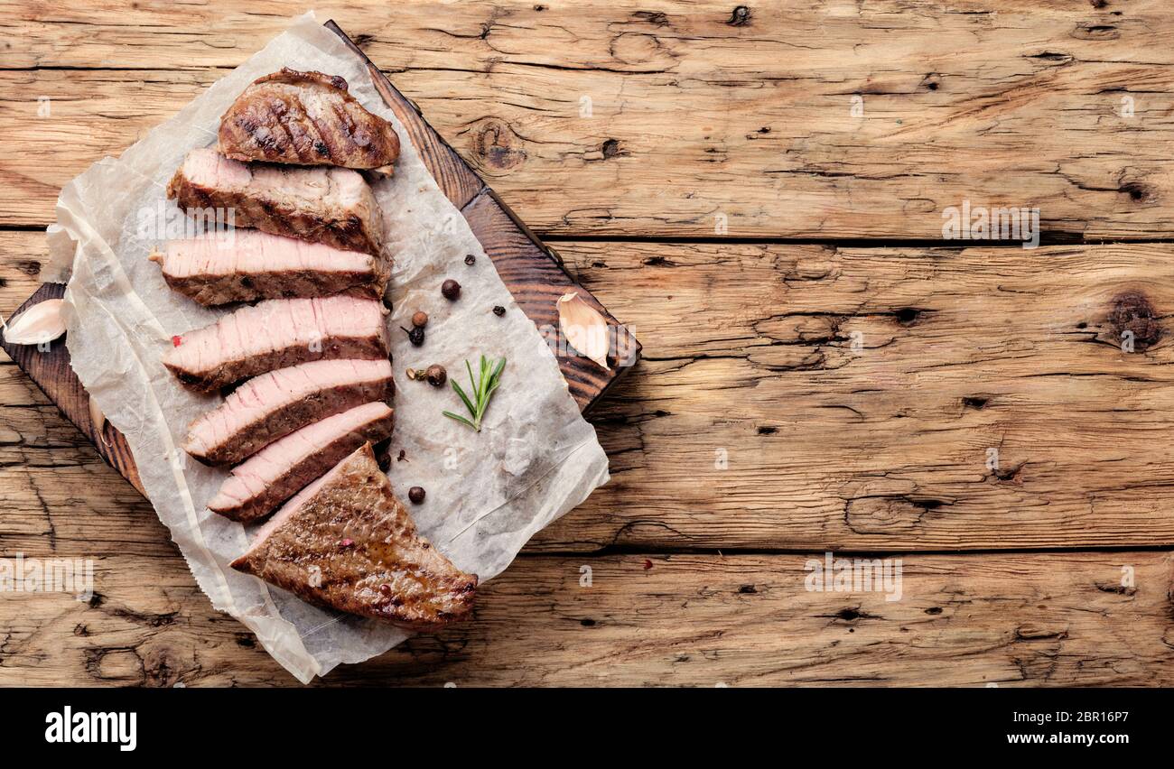 Sliced medium rare roast beef.Grilled ribeye beef steak Stock Photo - Alamy
