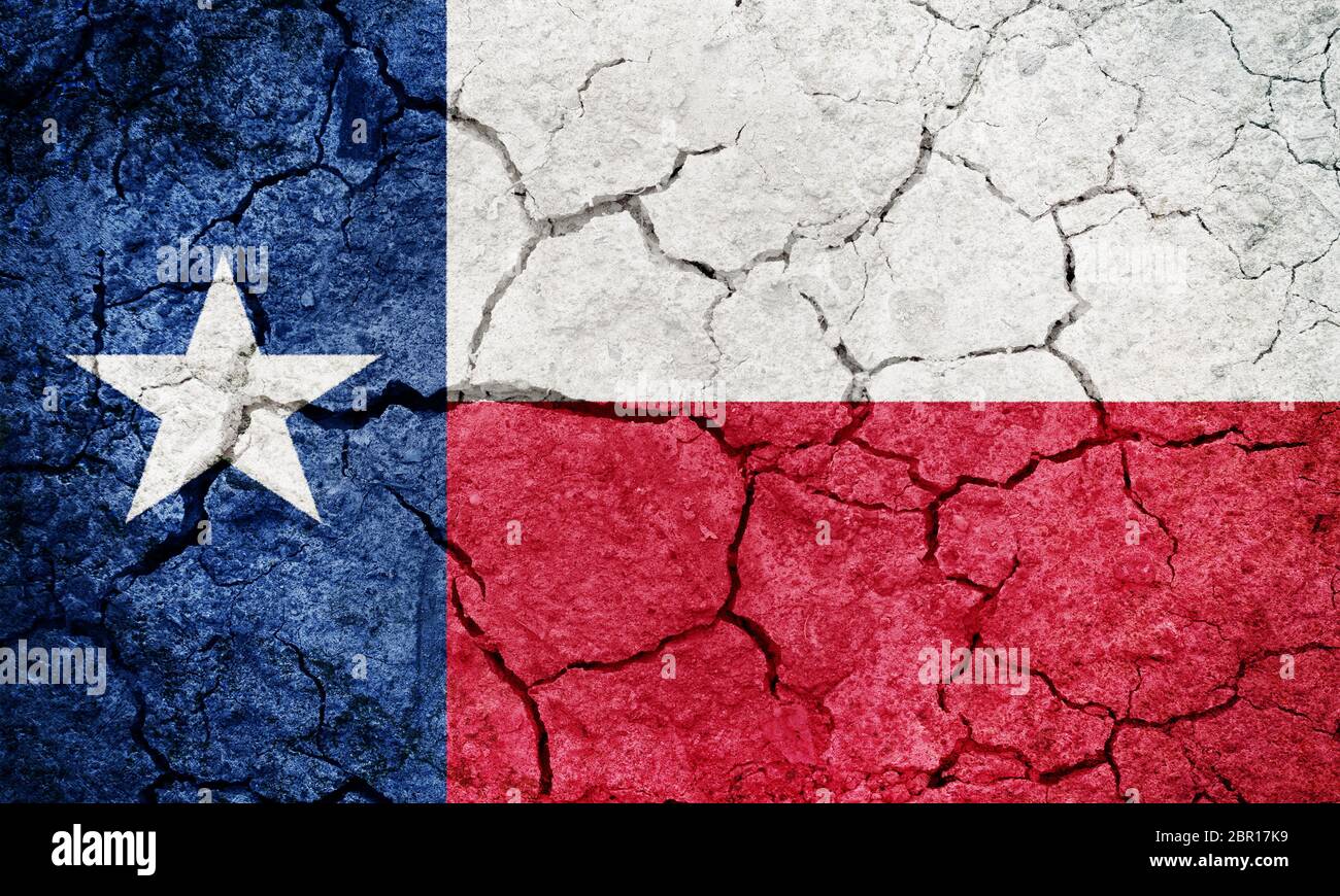 Flag of Texas on dry earth ground texture background Stock Photo - Alamy