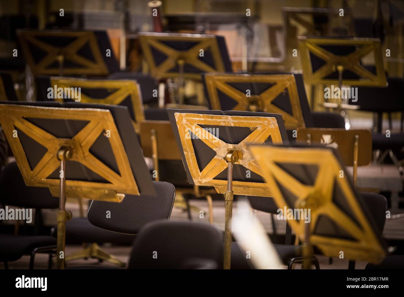 Color image of some orchestra empty seats on a stage Stock Photo - Alamy